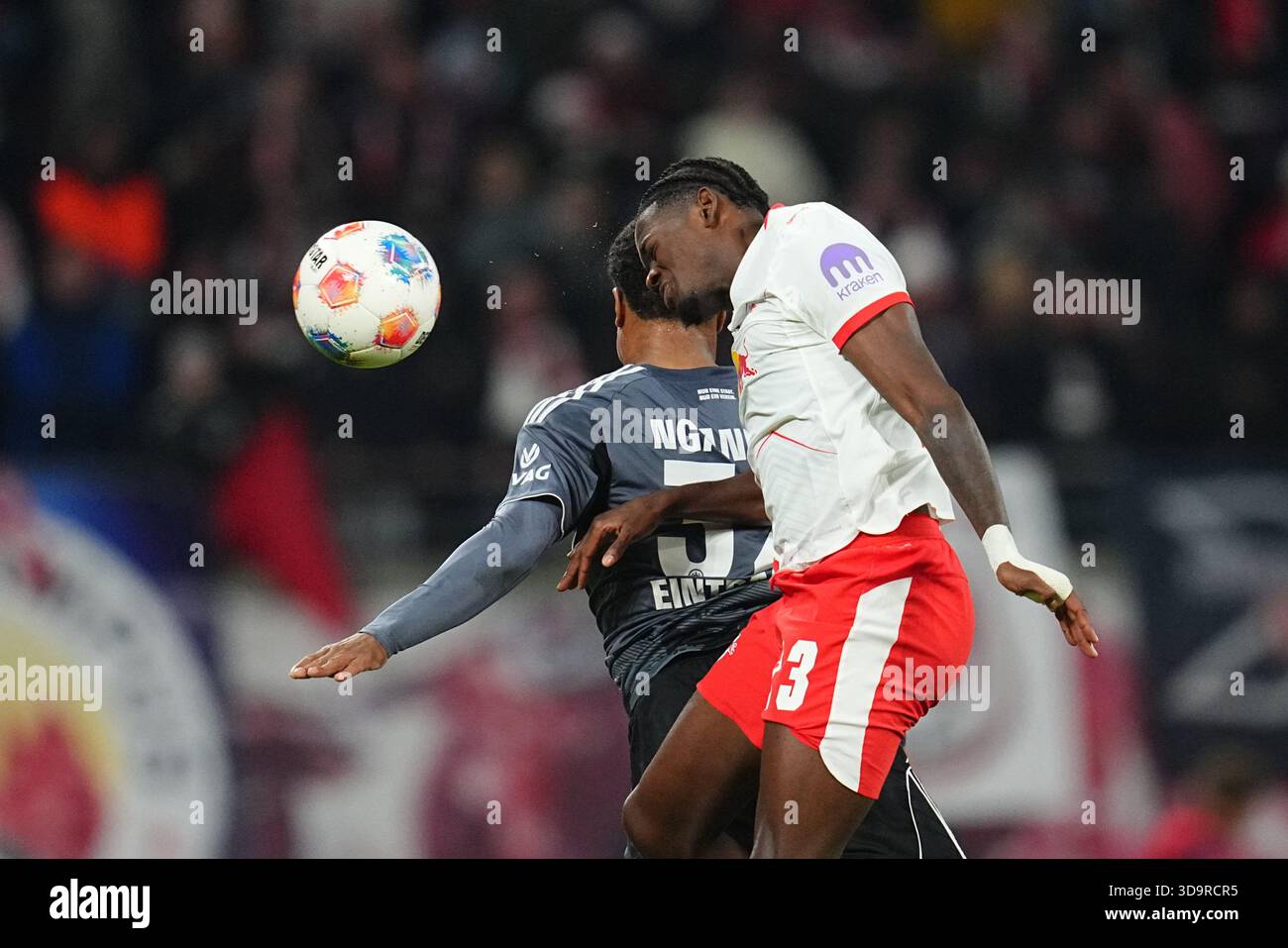 December 06 2025: Castello Lukeda of RB Leipzig heads during a 1 ...