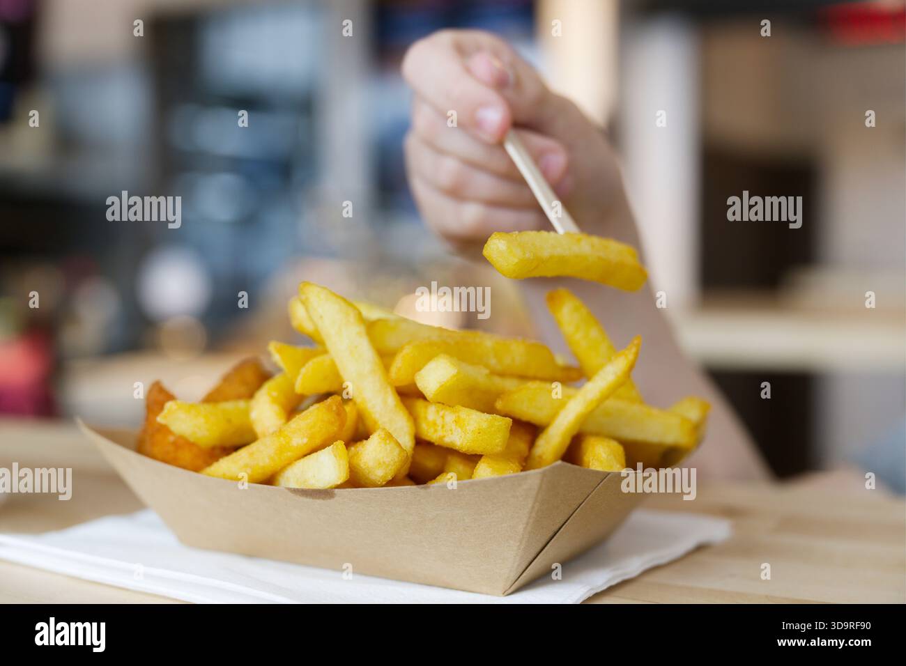 Child hand pick french fries hi-res stock photography and images - Alamy