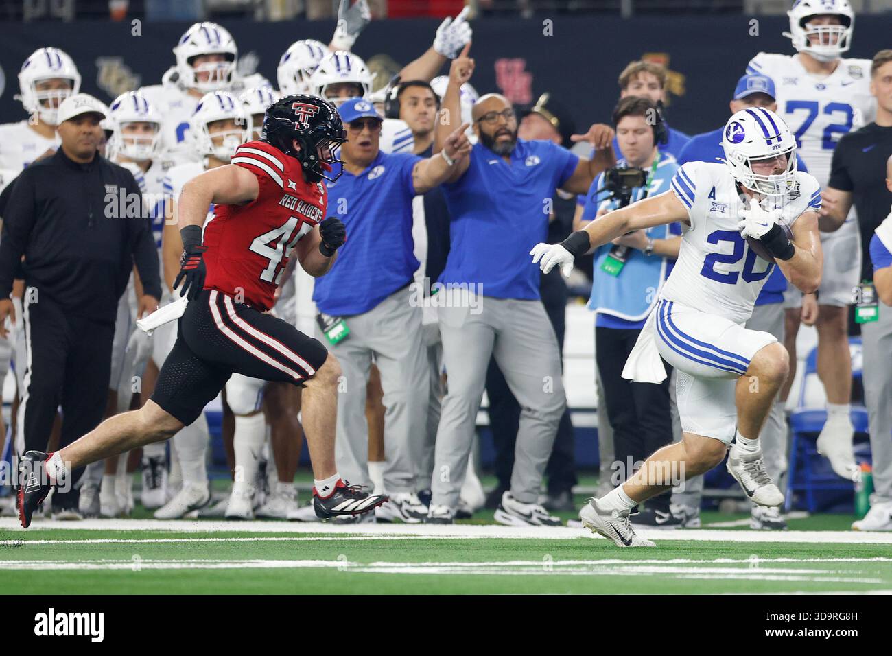 BYU tight end Carsen Ryan (20) runs after a catch as Texas Tech ...