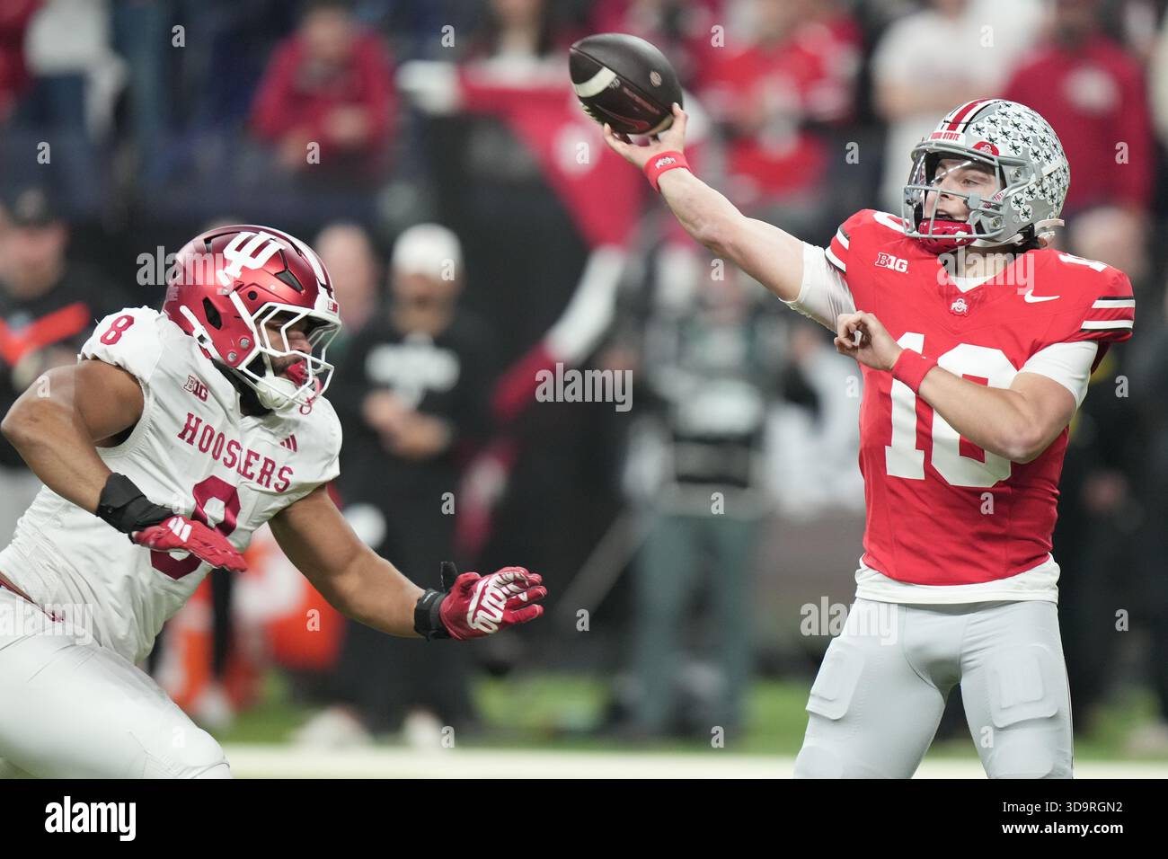Ohio State's Julian Sayin throws with pressure from Indiana's Stephen ...