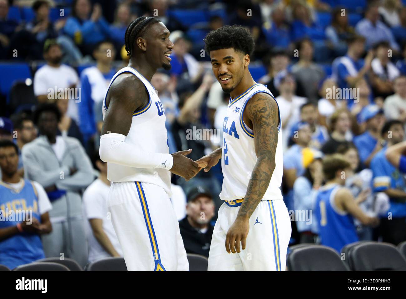 UCLA guard Eric Dailey Jr., left, and guard Donovan Dent celebrate ...