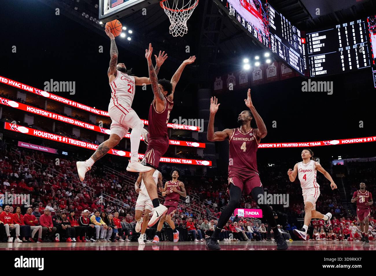 Houston guard Emanuel Sharp (21) shoots against Florida State guard ...