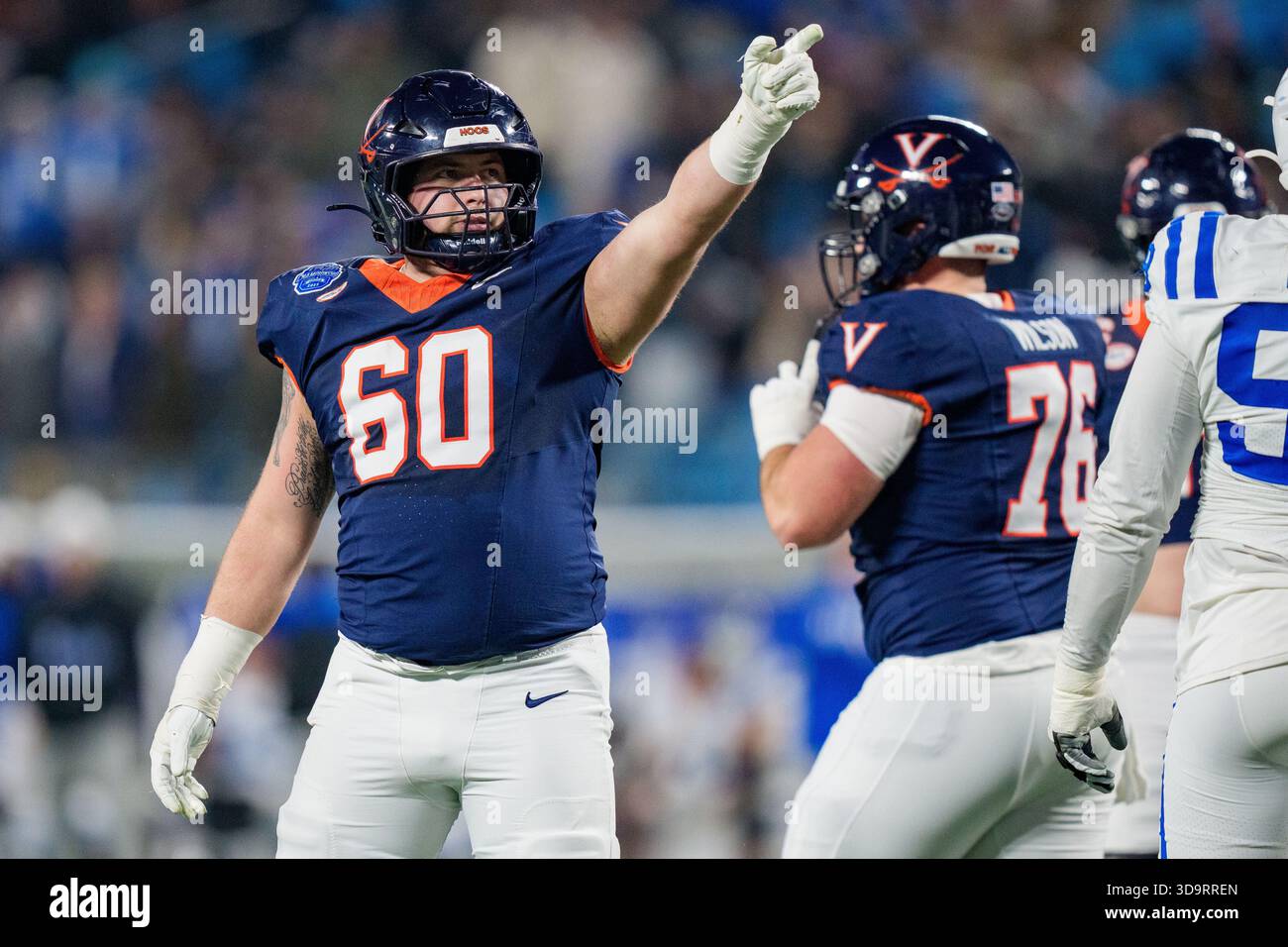 Virginia offensive lineman Drake Metcalf (60) reacts in the first half ...