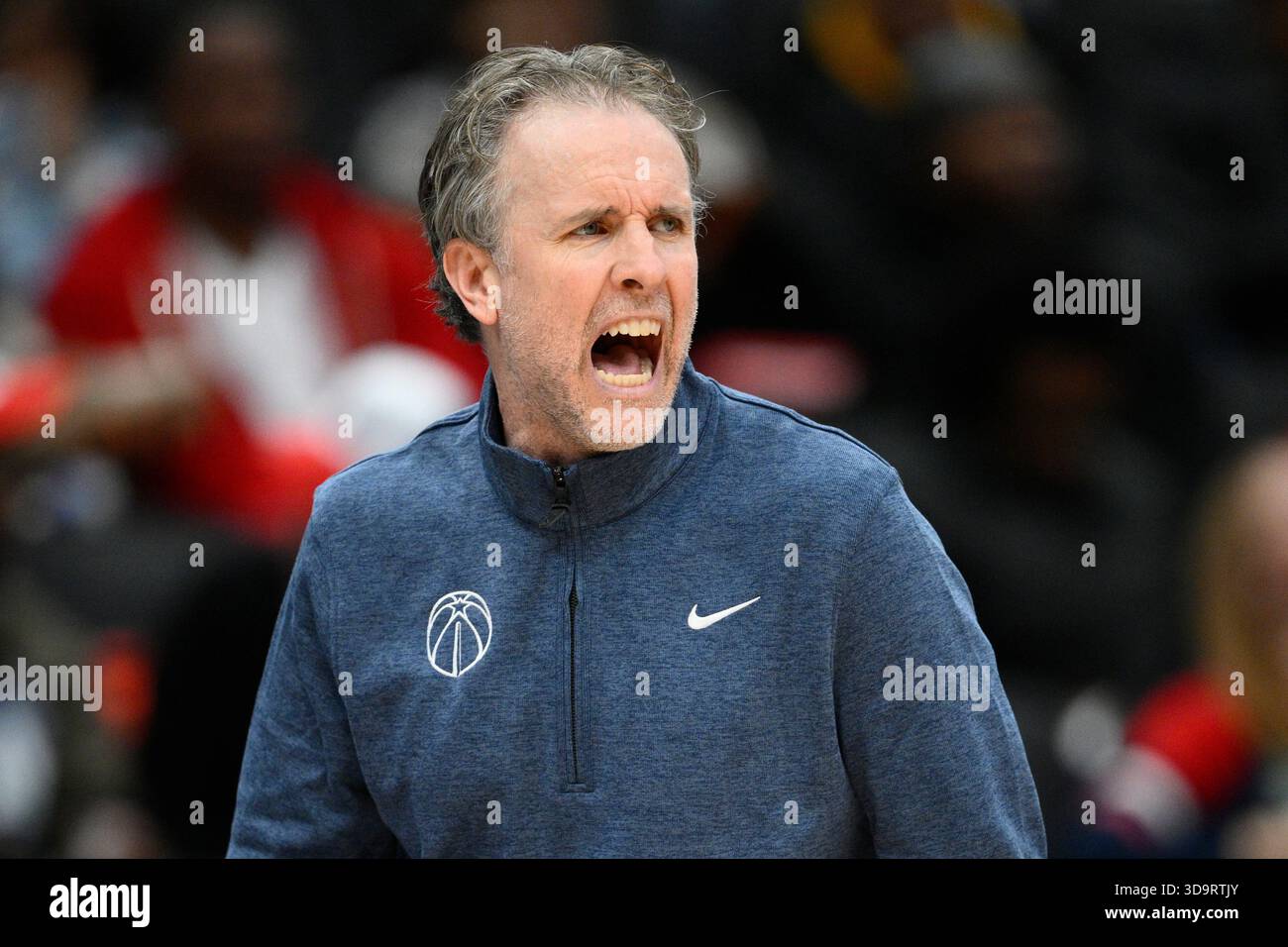 Washington Wizards head coach Brian Keefe reacts during the second half ...