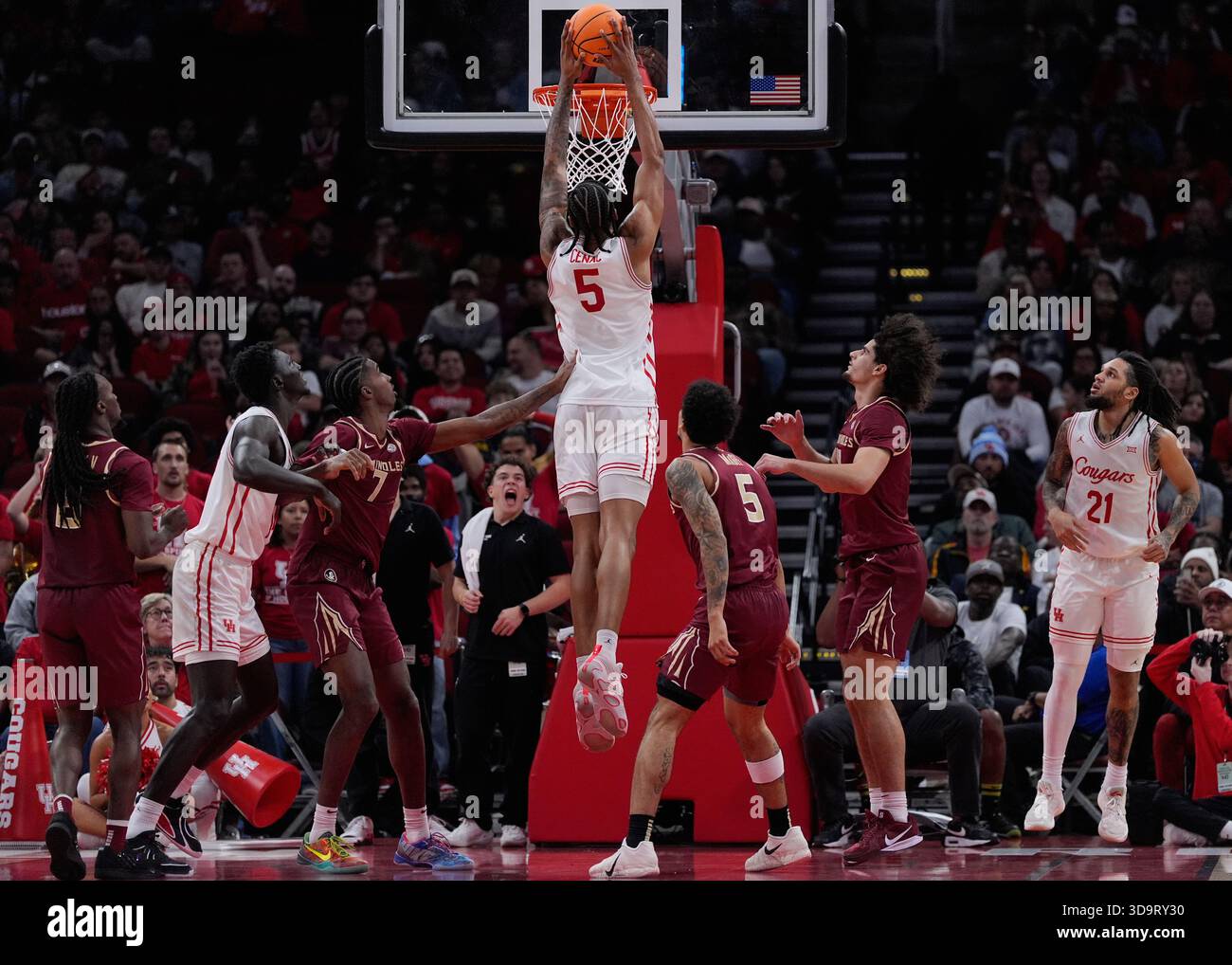 Houston center Chris Cenac Jr. (5) dunks during the second half of an ...