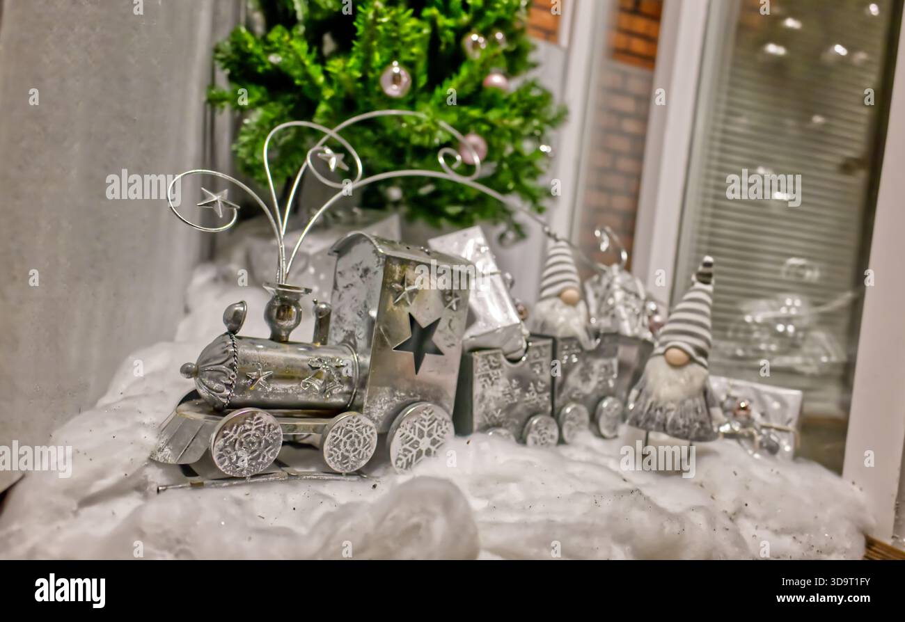 Festive silver train decoration hi-res stock photography and images - Alamy