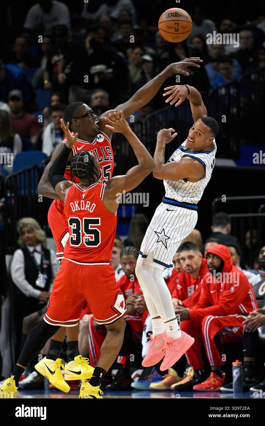 Orlando Magic guard Desmond Bane, right, passes the ball as Chicago ...