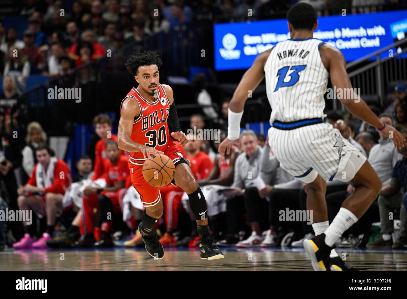 Chicago Bulls guard Tre Jones (30) is defended by Orlando Magic guard ...