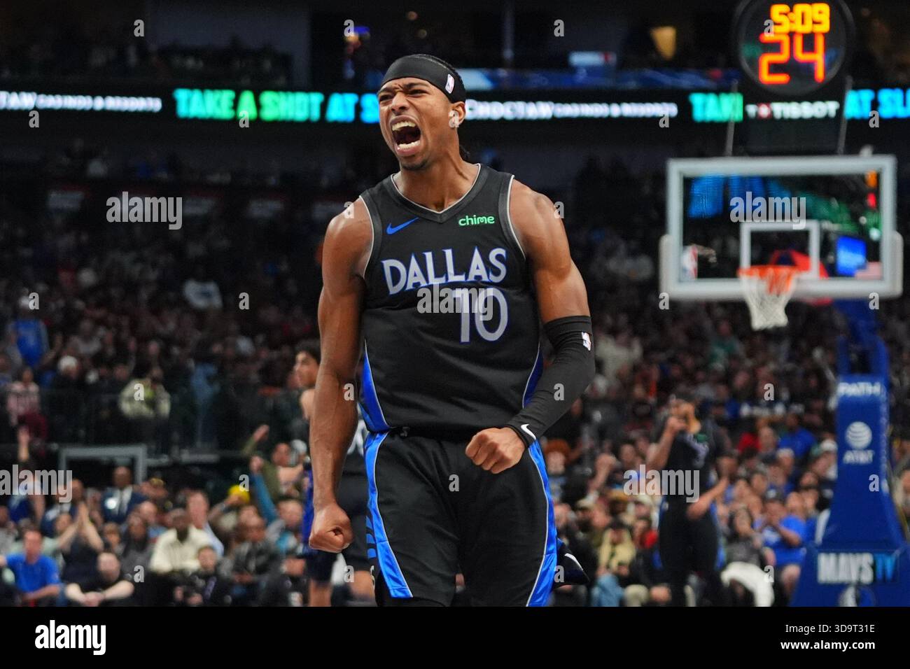 Dallas Mavericks guard Brandon Williams (10) reacts after a play during ...