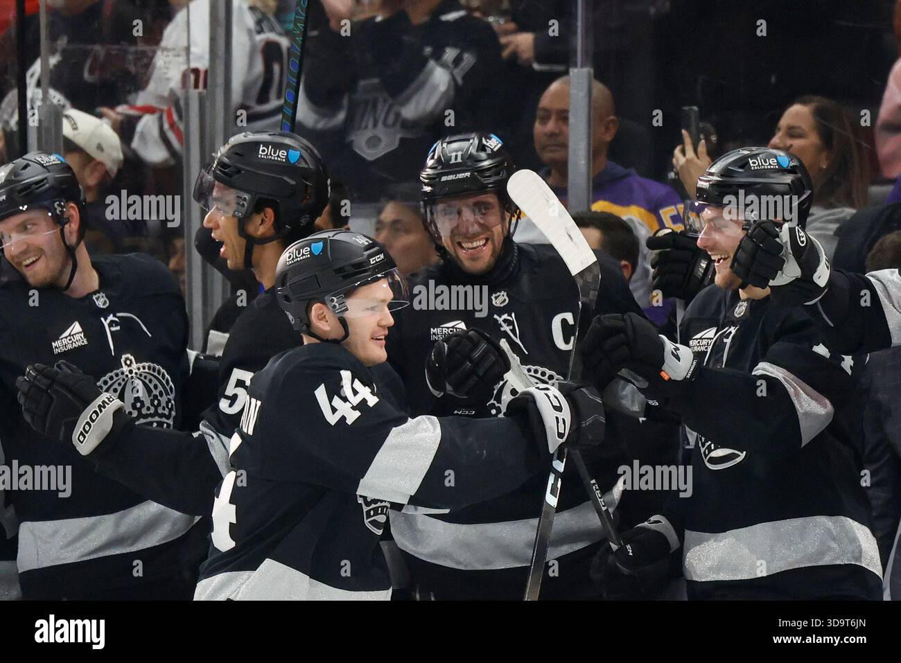Los Angeles Kings defenseman Mikey Anderson (44) is greeted by ...