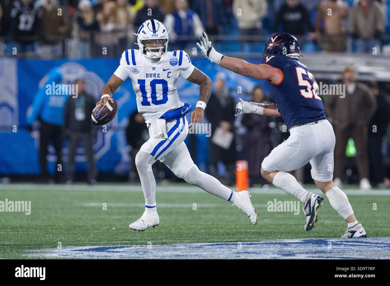 December 6, 2025: Duke Blue Devils quarterback Darian Mensah (10) rolls ...