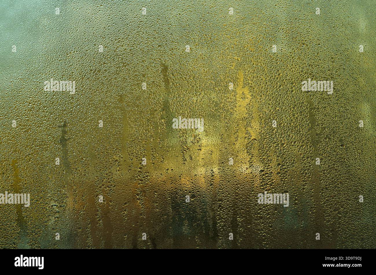 misty window showing blurry view of trees and buildings. condensation ...