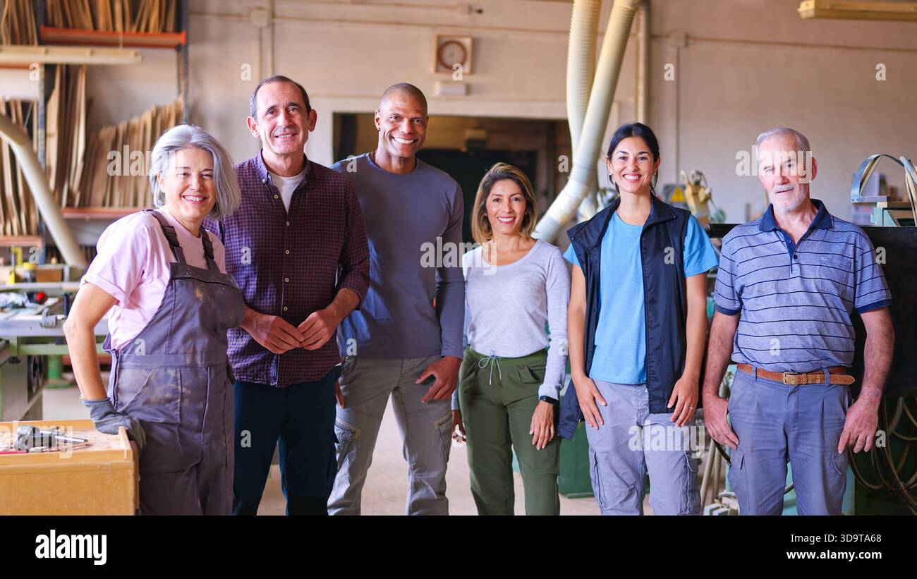 Multi generational workers smiling hi-res stock photography and images ...