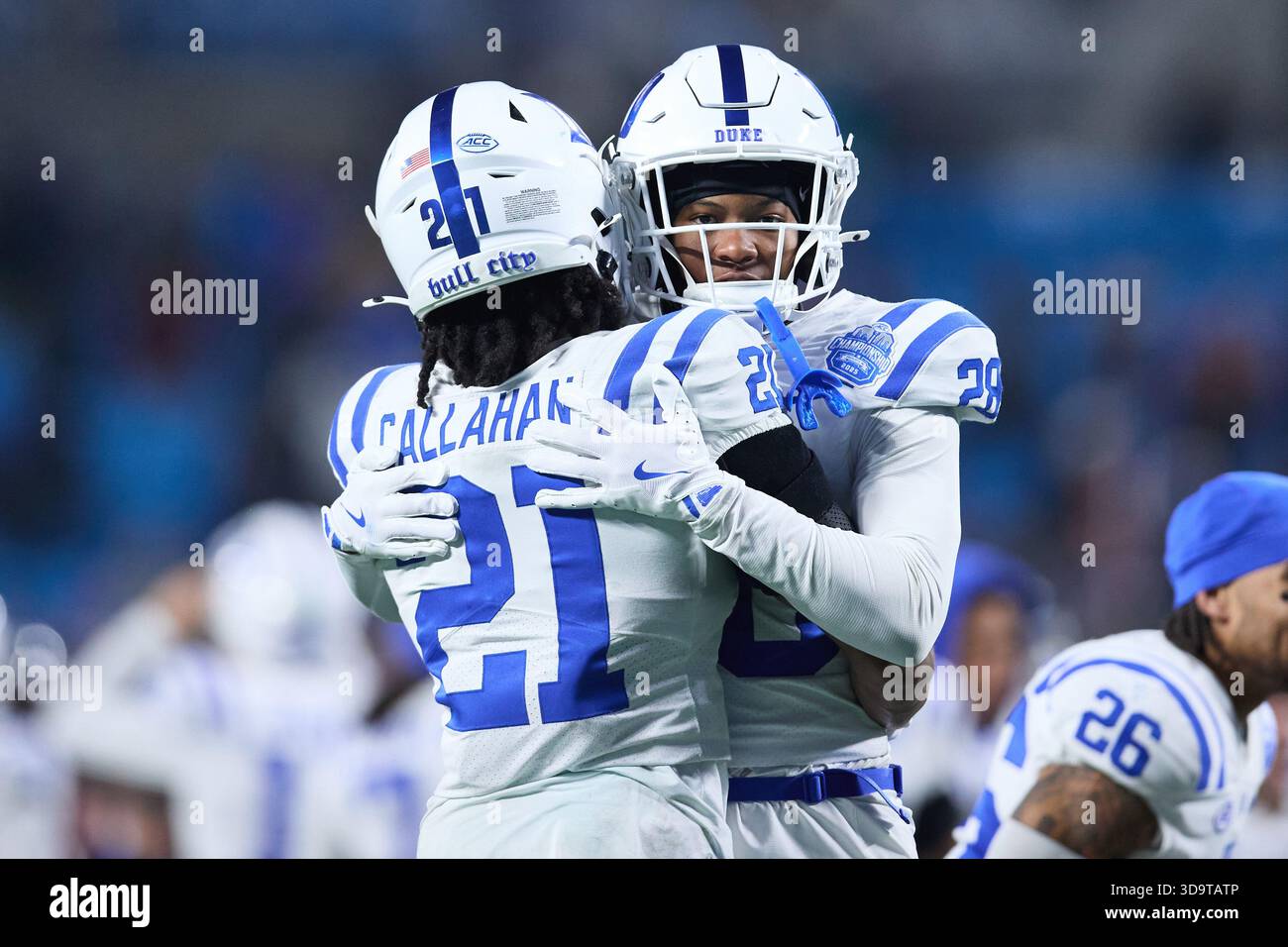 Duke Blue Devils cornerback Landan Callahan (21) gets a hug from ...