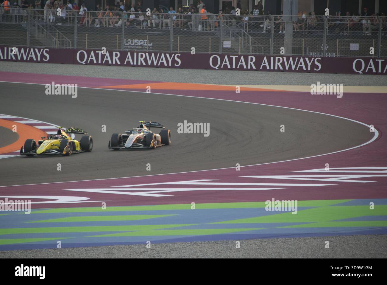 Teams watching the action on the track hi-res stock photography and ...