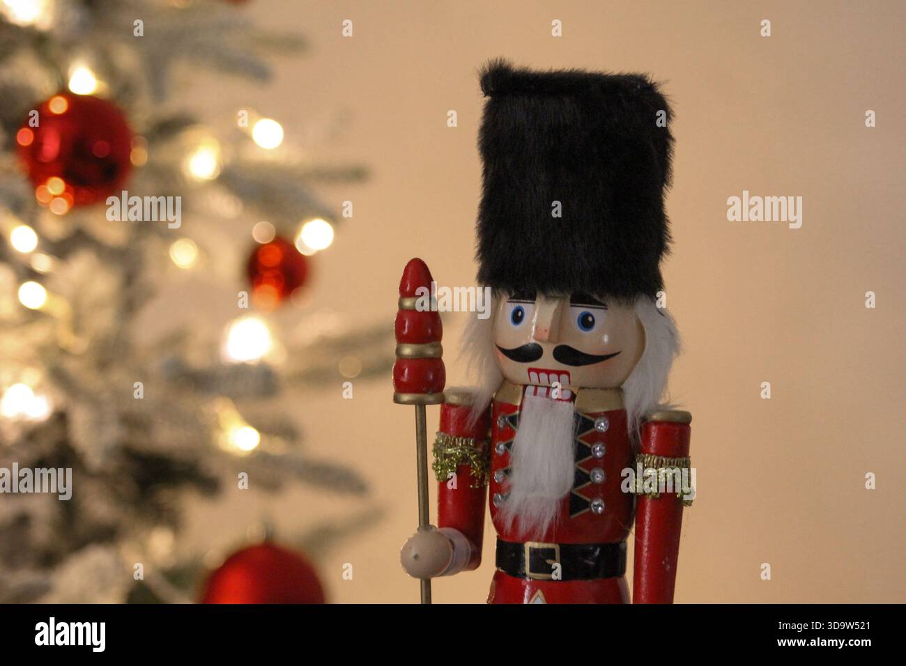 Nutcracker behind christmas tree in hi-res stock photography and images ...