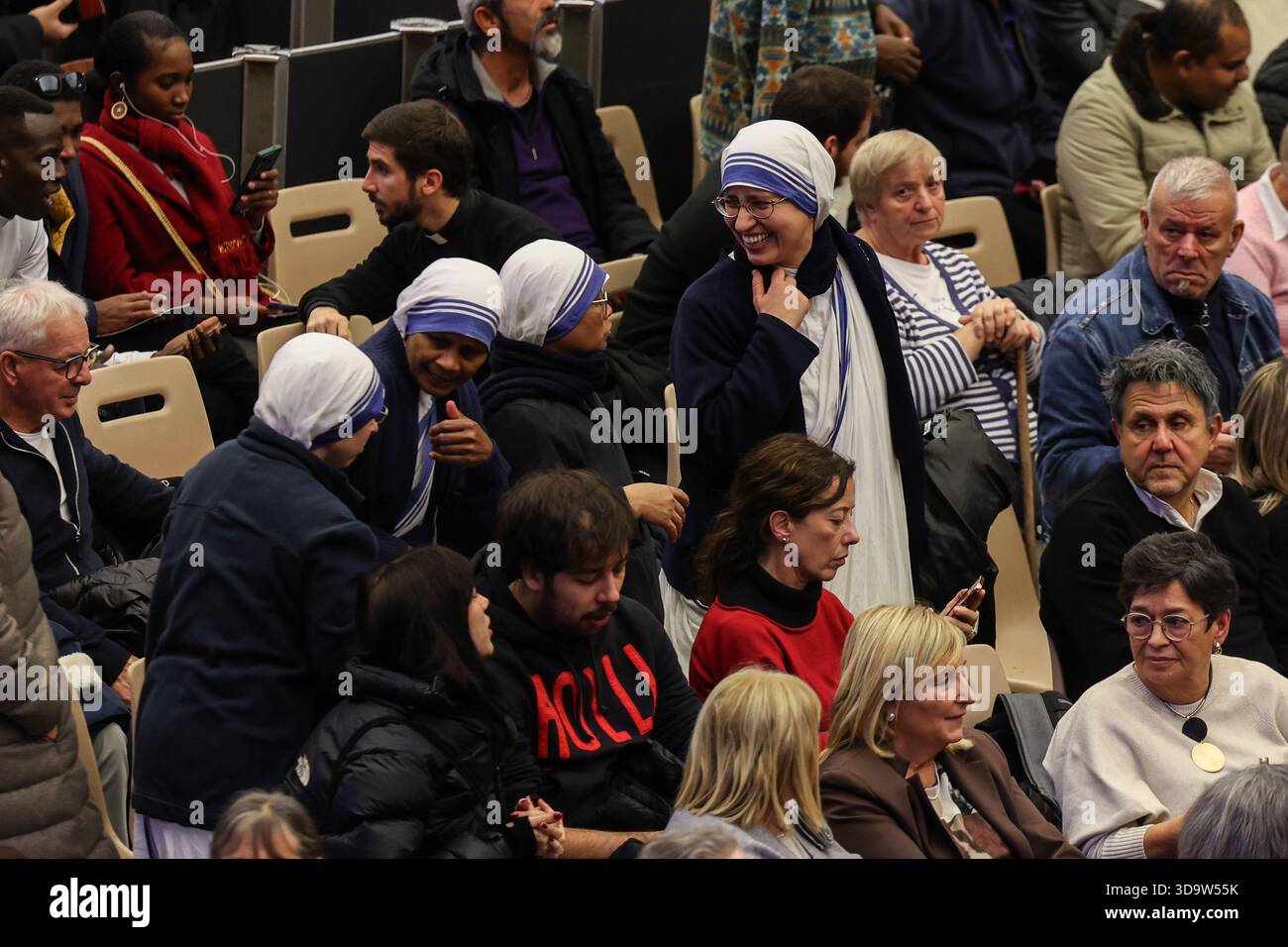 Nuns of the Order of Mother Teresa of Calcutta wait at the hall for the ...