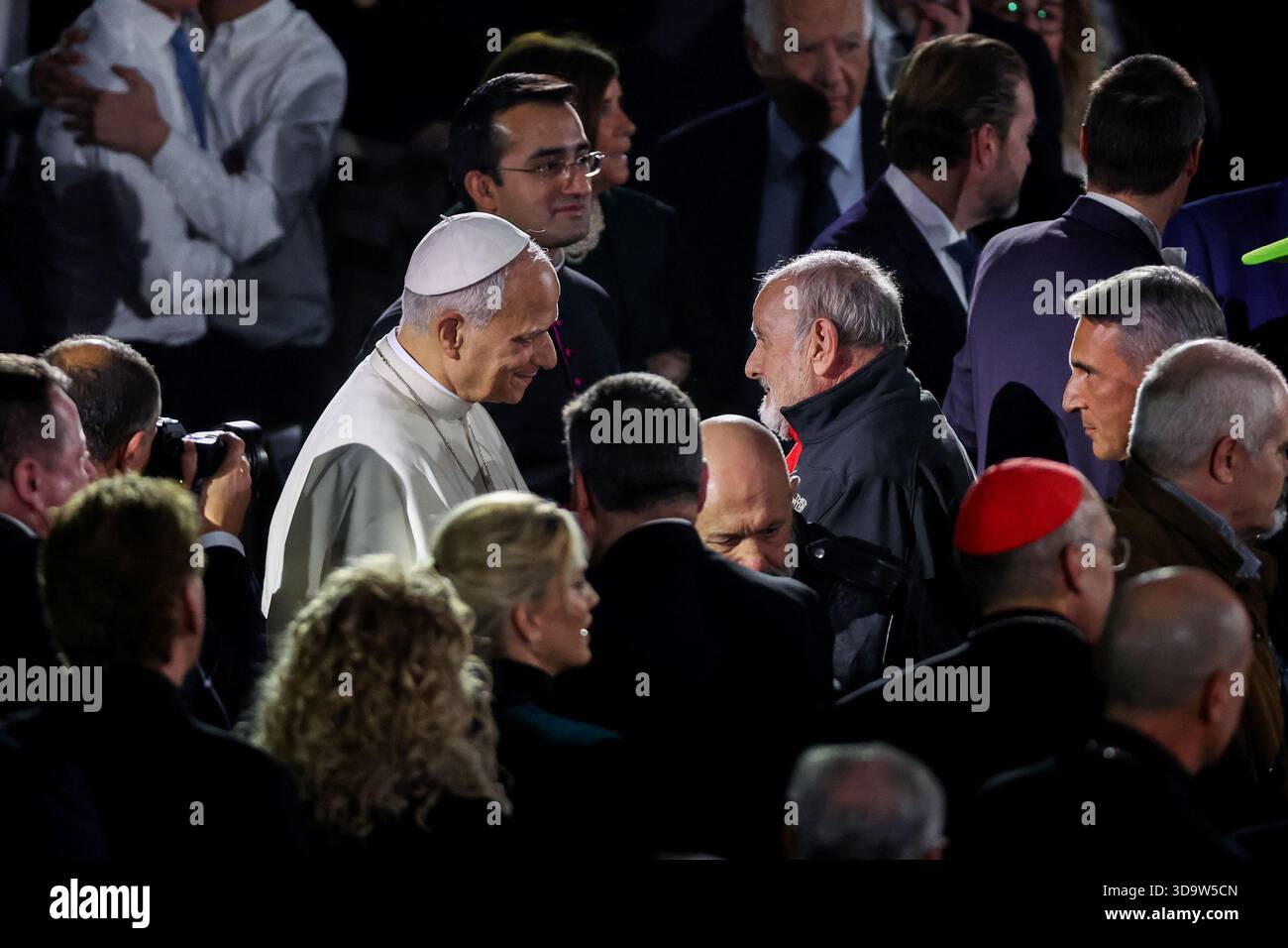The pontiff greets the poor people who came to the concert. Pope Leo ...