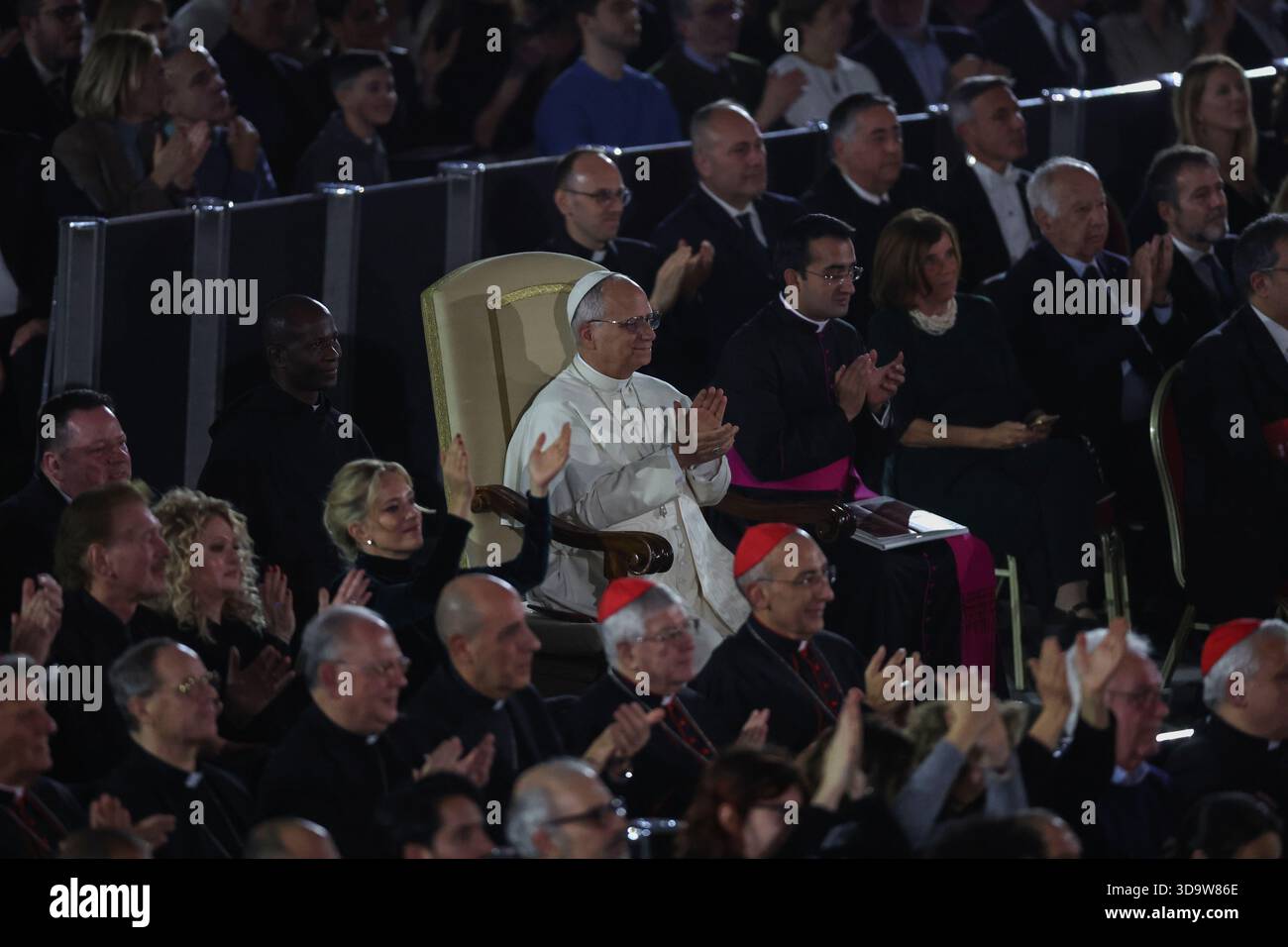 The pontiff applauds at the end of Michael Steven Buble's performance ...