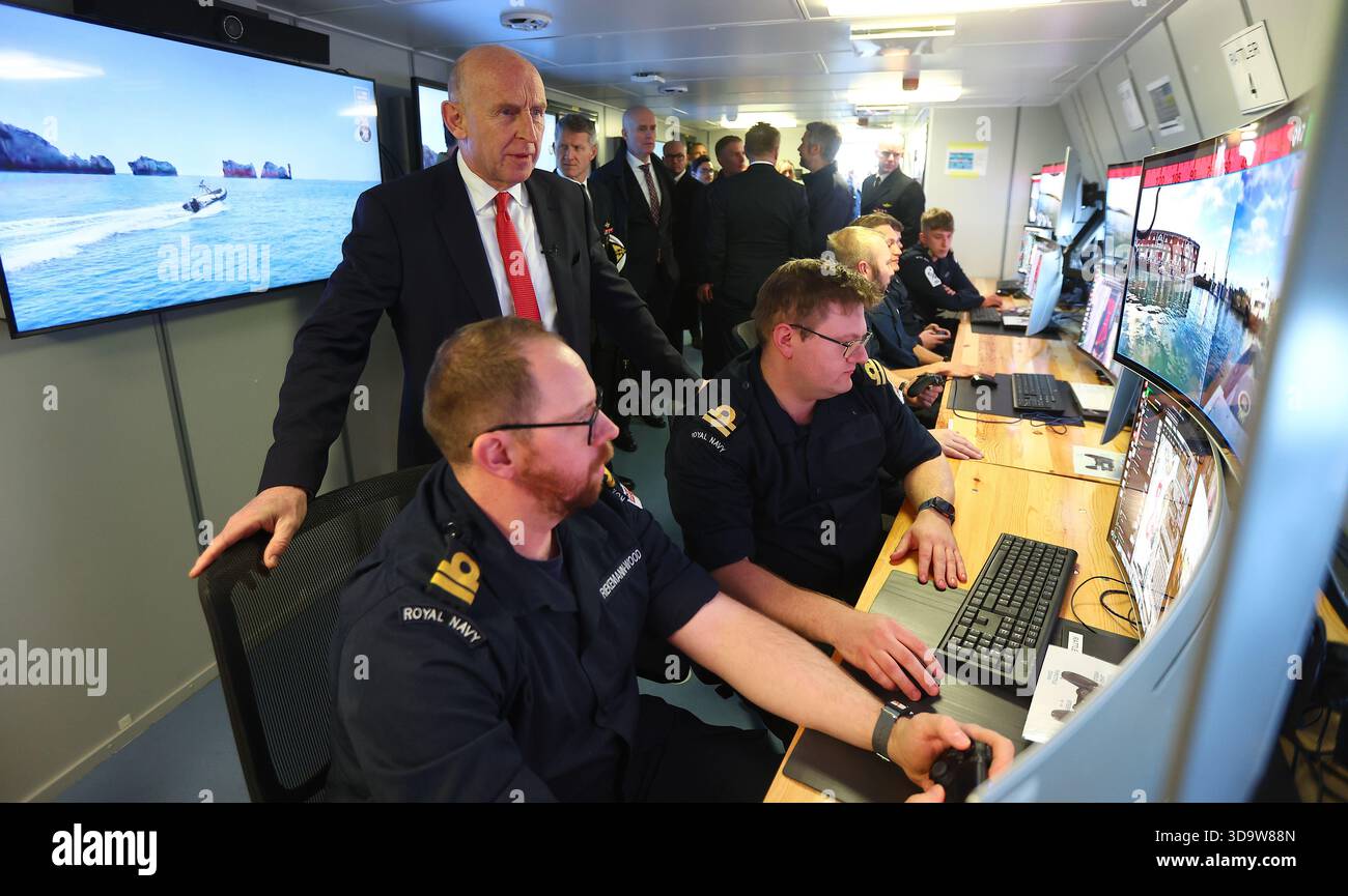 EMBARGOED TO 0001 MONDAY DECEMBER 8 Defence Secretary John Healey meets ...