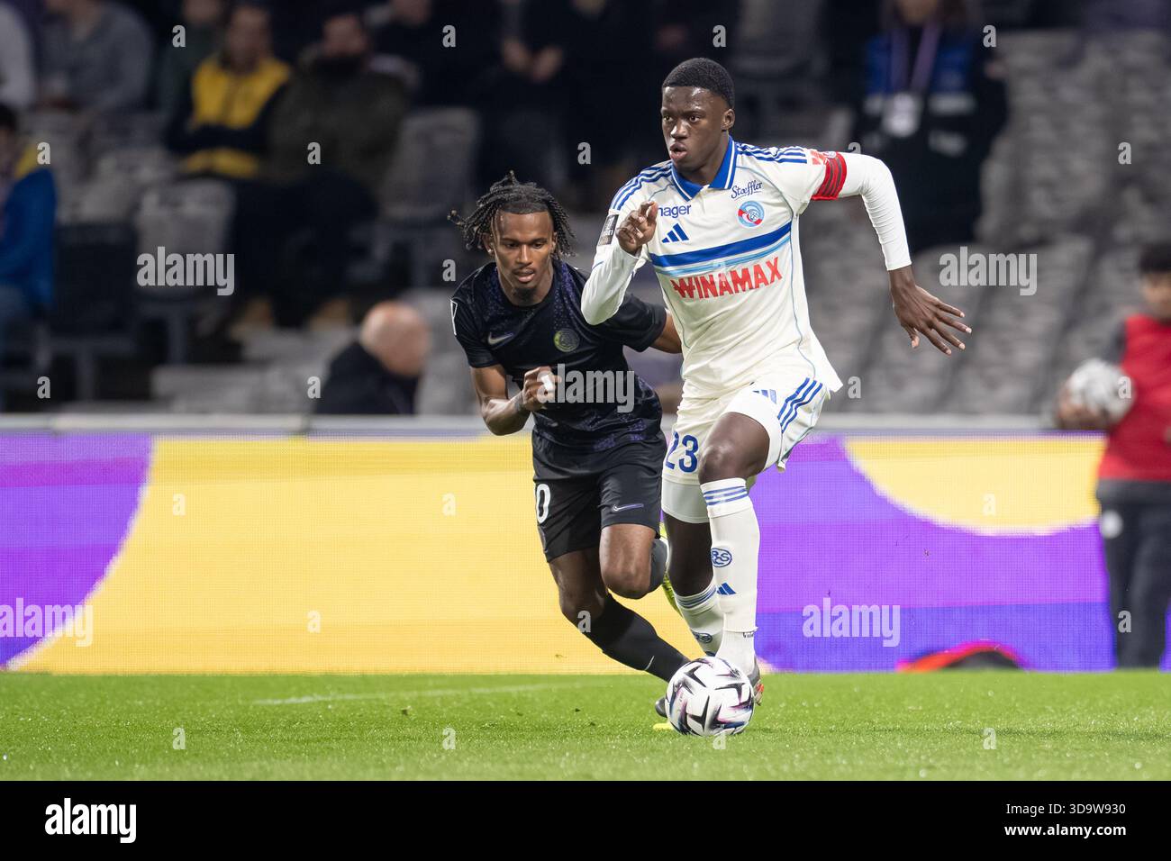 Yann Gboho of Toulouse Football Club and Mamadou Sarr of Strasbourg ...