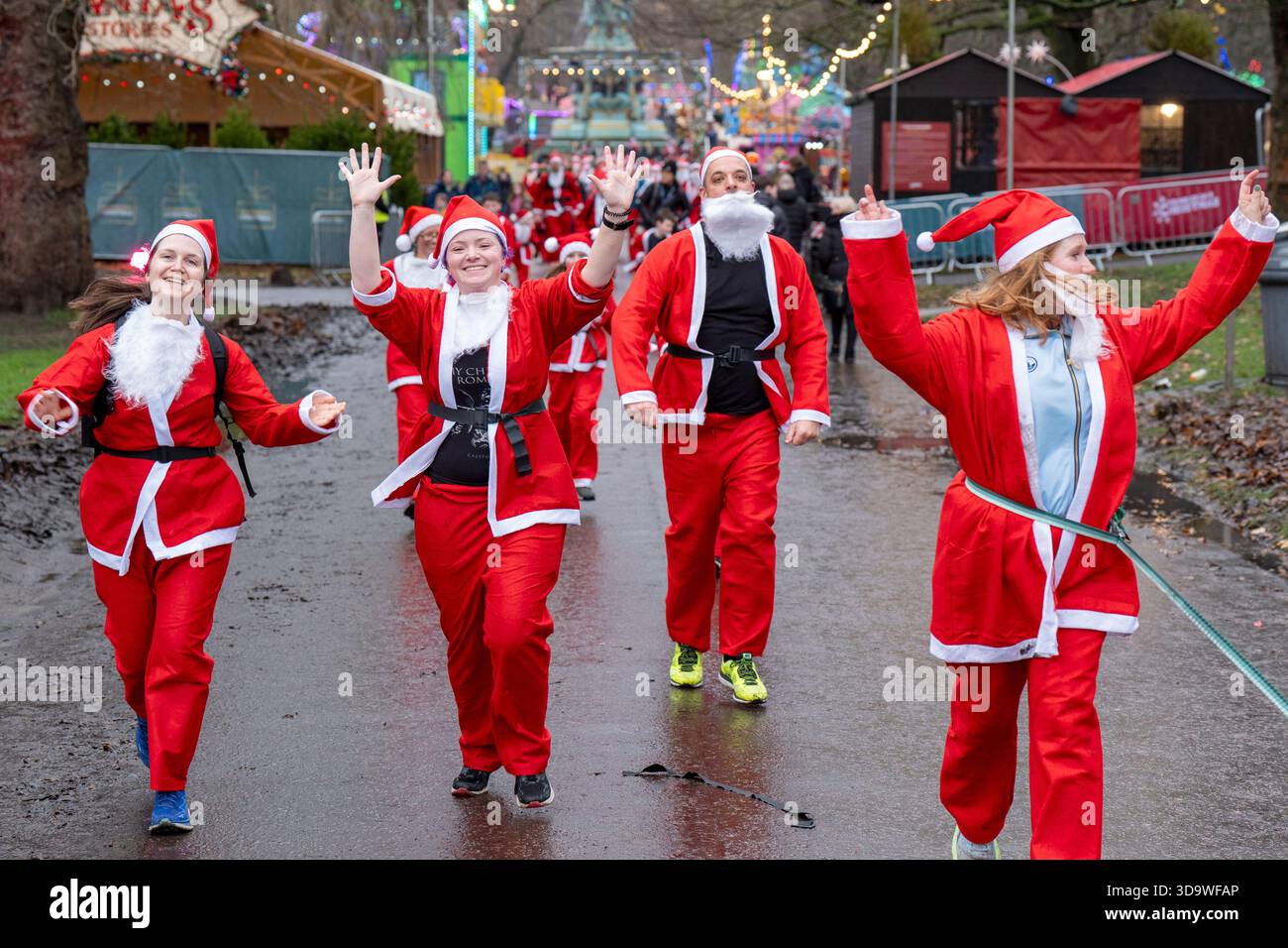 Hundreds of people take part in the annual festive Santa Dash through ...