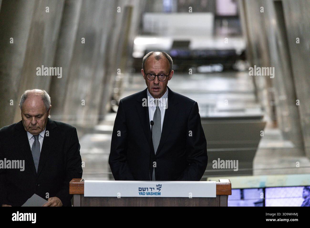 German Chancellor Friedrich Merz, right, makes a statement next to Dani ...