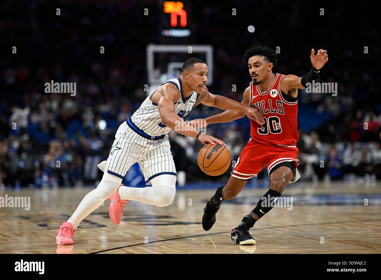 Orlando Magic guard Desmond Bane, left, is defended by Chicago Bulls ...