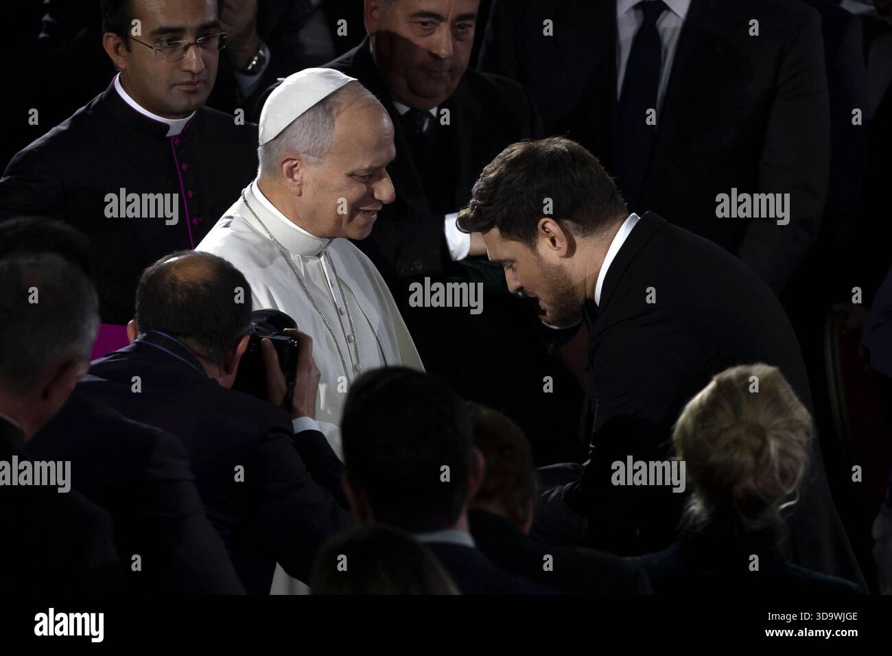 Pope Leo XIV greets singer Michael Buble at the end of the Christmas ...