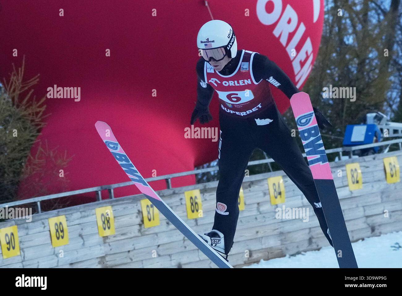 Erik Belshaw of the United States, soars through the air during his ...