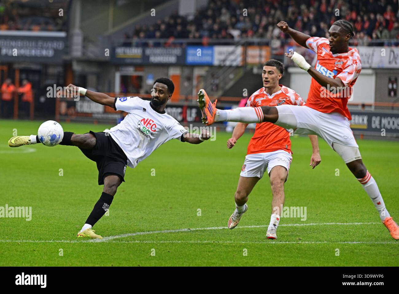 VOLENDAM - Eli Dasa of NEC, Gibson Yah of FC Volendam during the Dutch ...