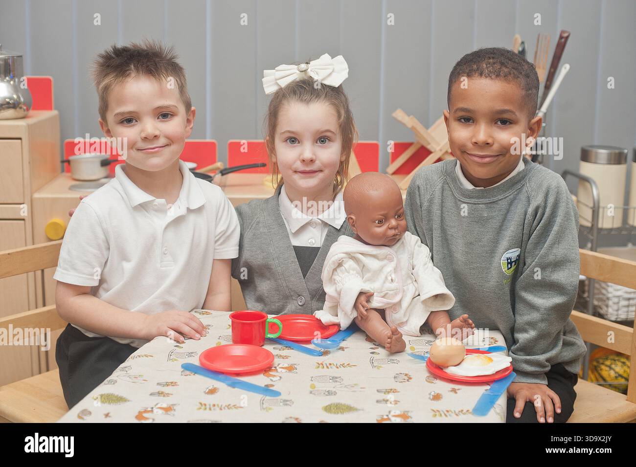 Primary school children practice tasks of daily adult life, including ...