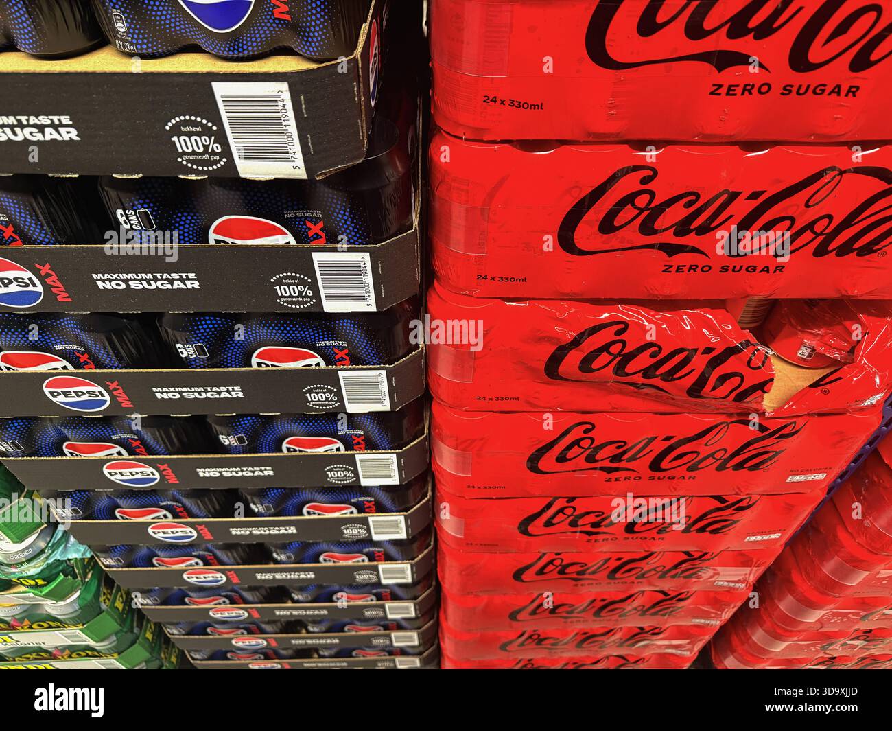 Stacks of Coca Cola and Pepsi Cola boxes in store. Copenhagen, Denmark ...