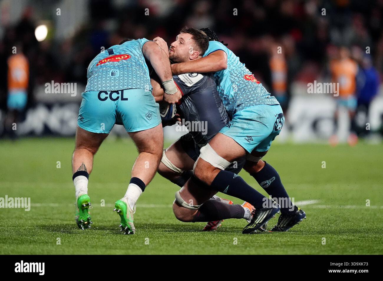 Gloucester Rugby's Will Trenholm (centre) is tackled by Castres ...