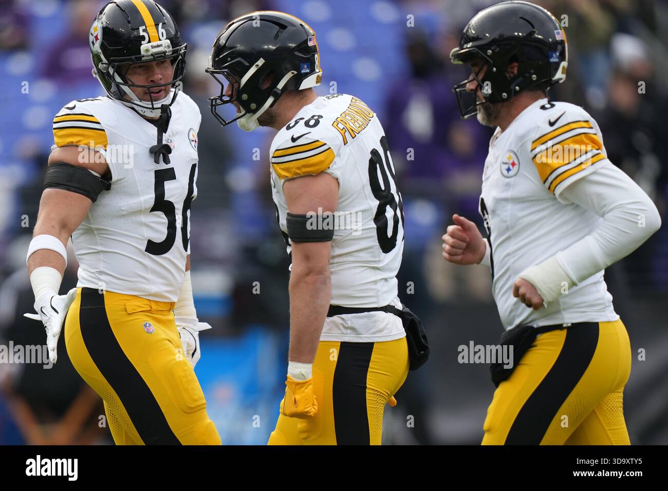 Pittsburgh Steelers linebacker Alex Highsmith (56) greets tight end Pat ...