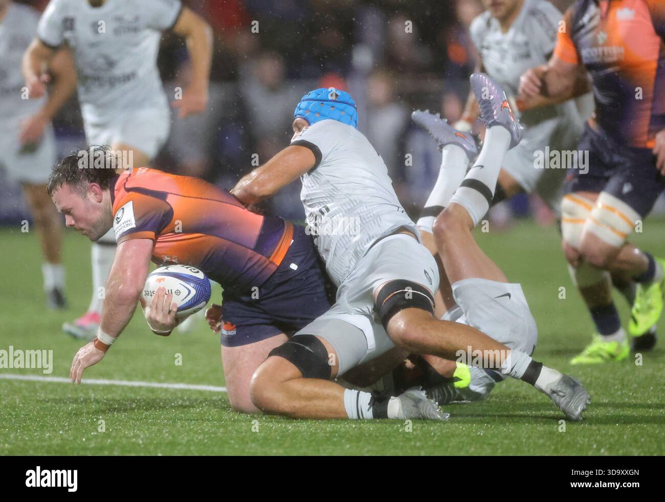 Edinburgh's Ewan Ashman is tackled by Toulon's Zach Mercer during the ...