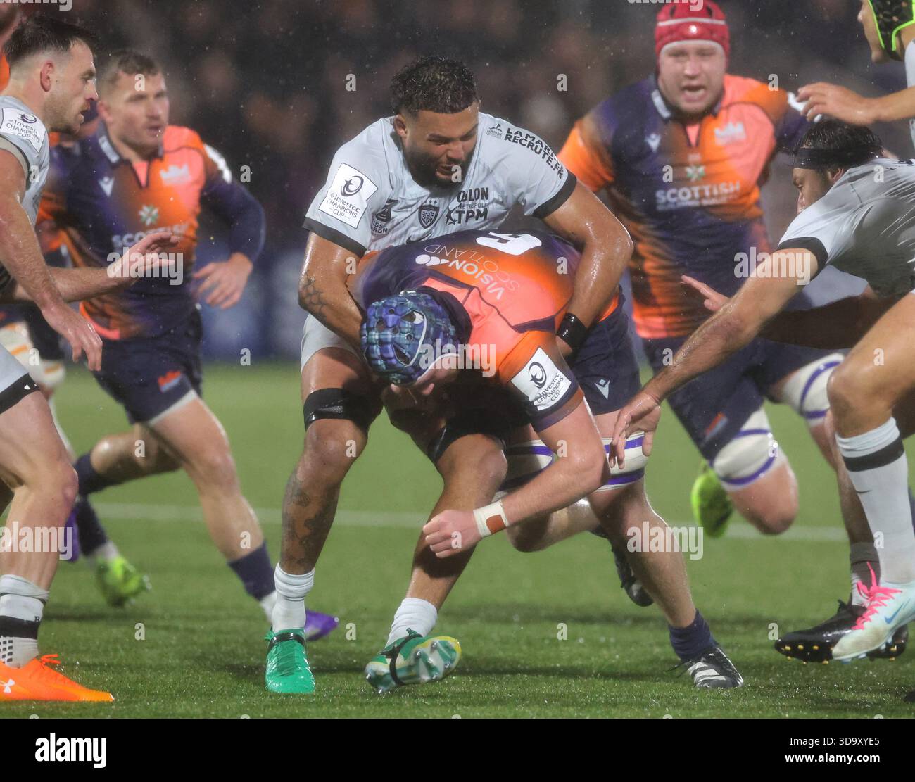 Edinburgh's Liam McConnell is tackled by Toulon's Lewis Ludlam during ...