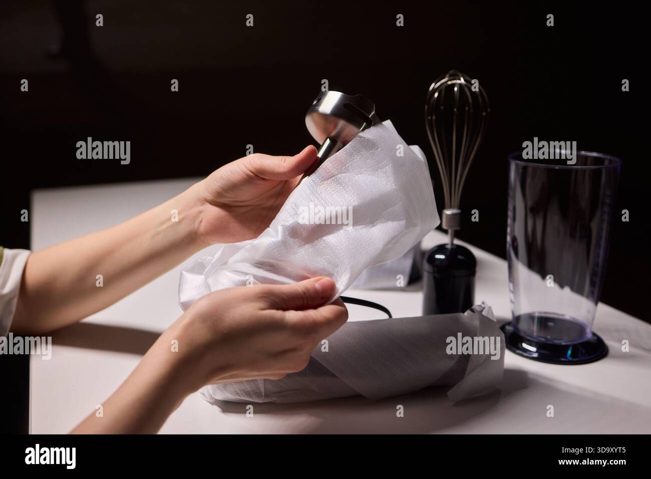 Preparing blender on kitchen counter, Scene shows detailed process of ...