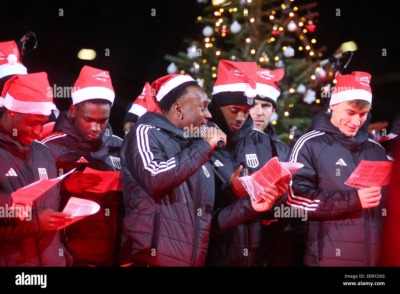 LINZ, AUSTRIA - DECEMBER 7: George Bello of LASK singing christmas ...