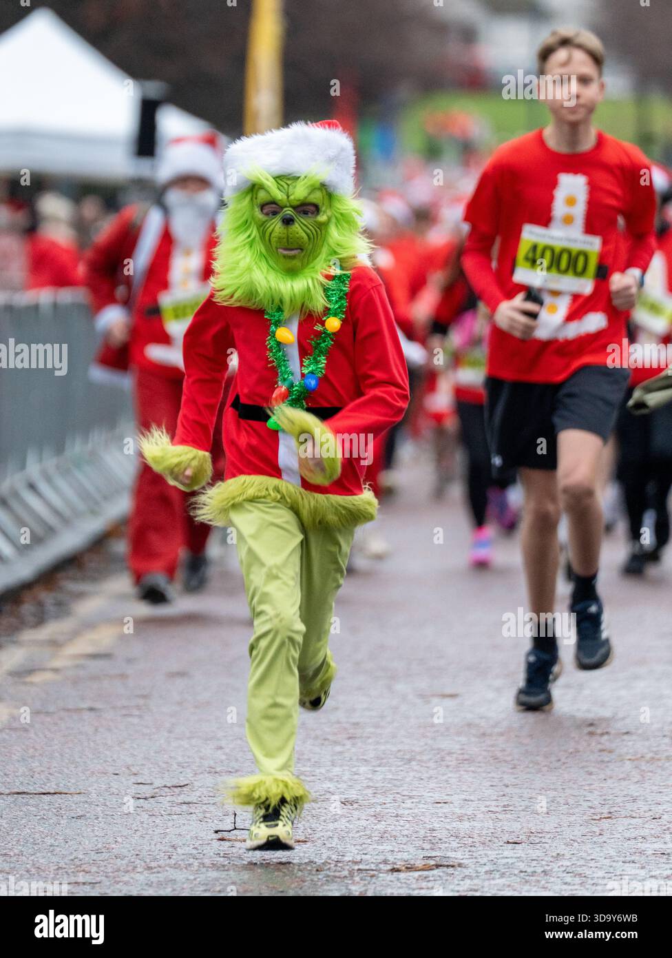 Glasgow Scotland, UK. 7th December 2025. The annual Santa Dash, a 5K ...