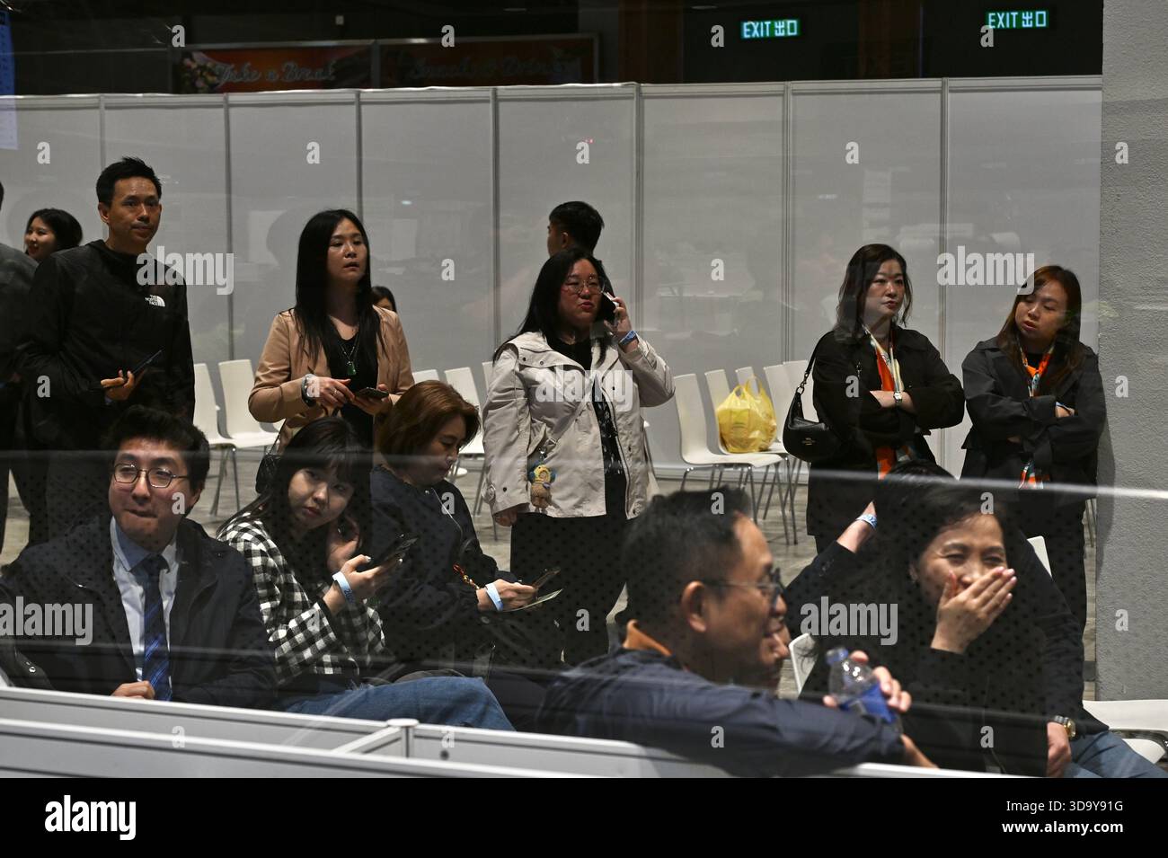 People watching the Election Committee Constituency counting on ...