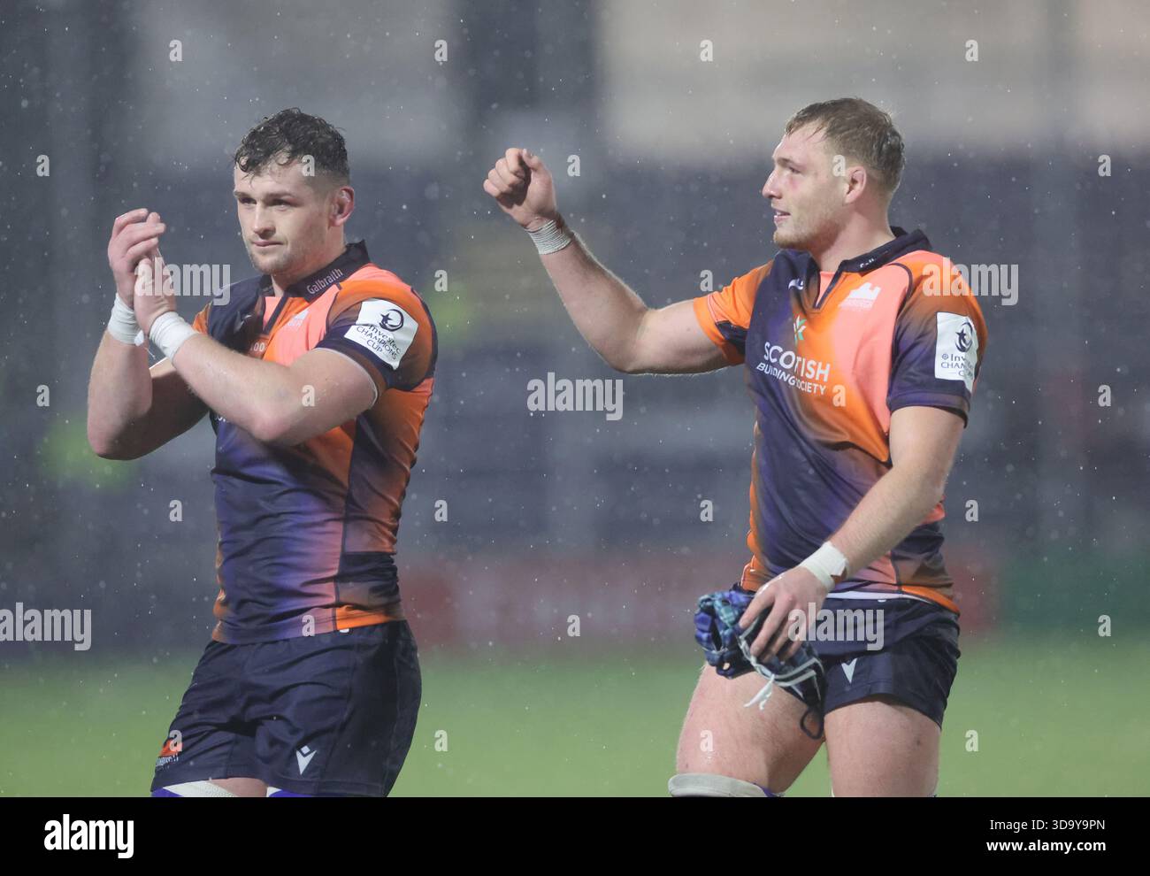Edinburgh's Liam McConnell (right) celebrates with a teammate following ...