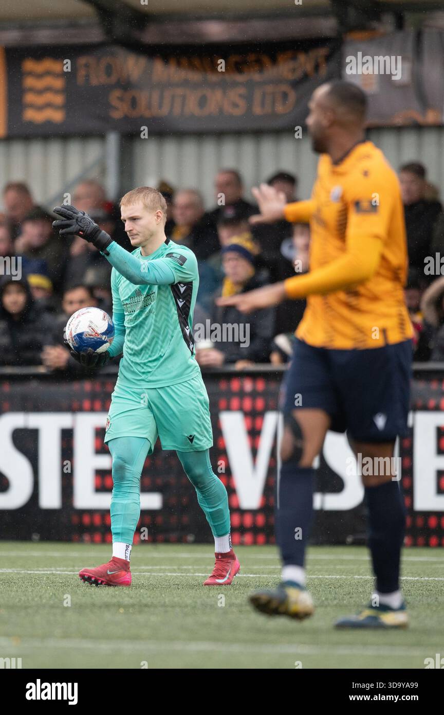 Slough, England. 7th Dec 2025. Slough Town’s Adam Desbois (left) during ...
