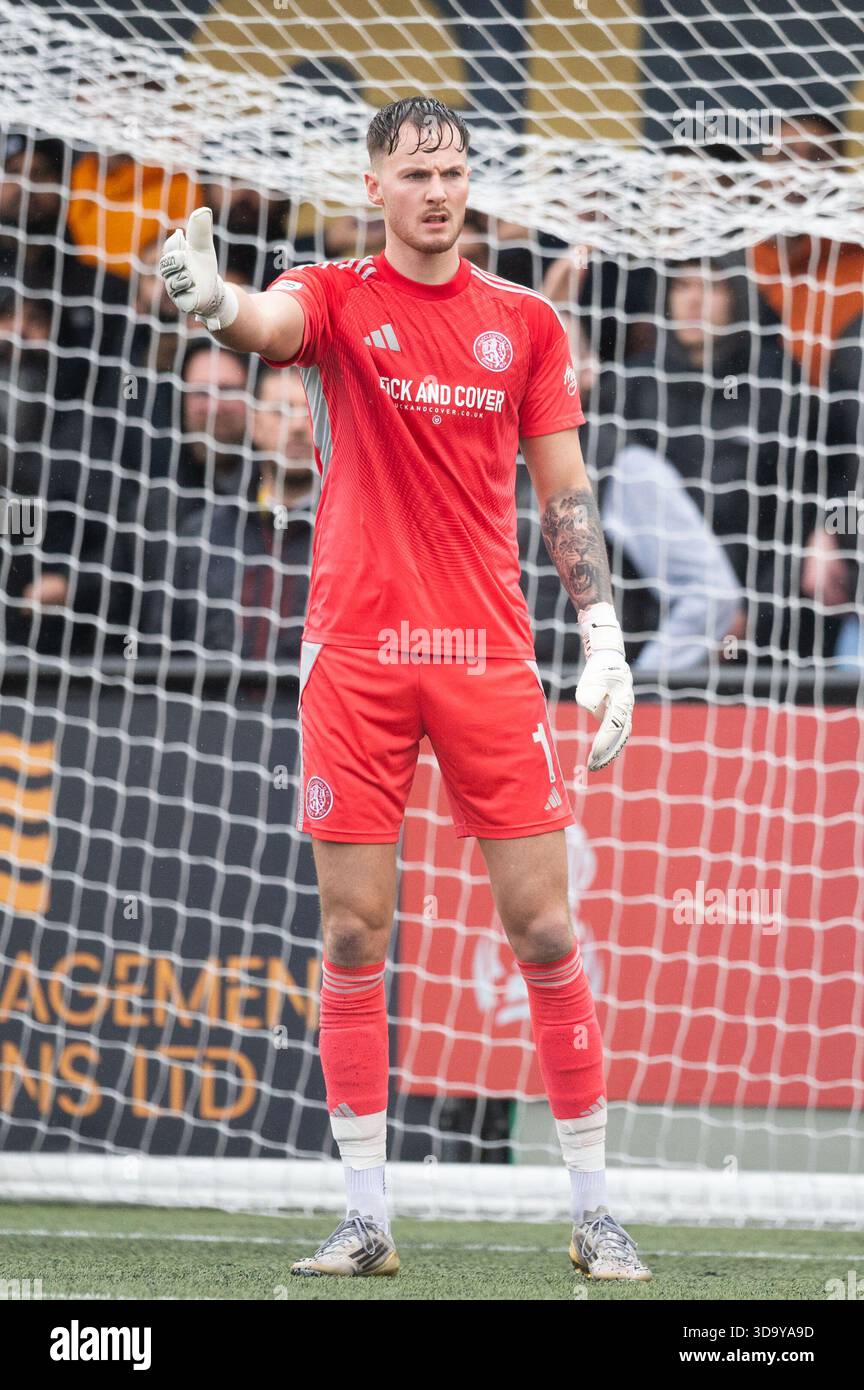 Slough, England. 7th Dec 2025. Macclesfield’s Max Dearnley during the ...