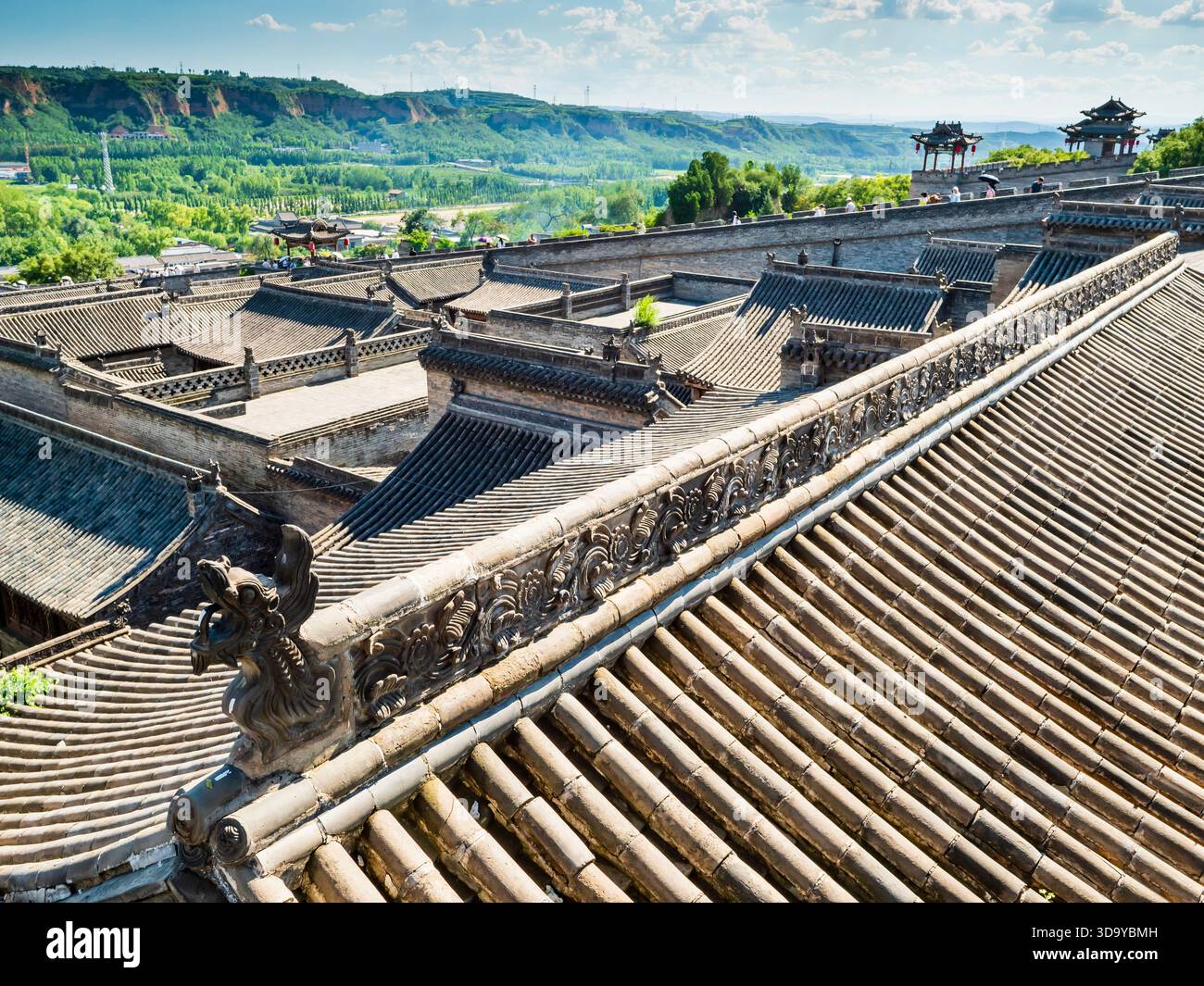 Traditional Chinese tiled roofs at the historic Wang Family Courtyard ...