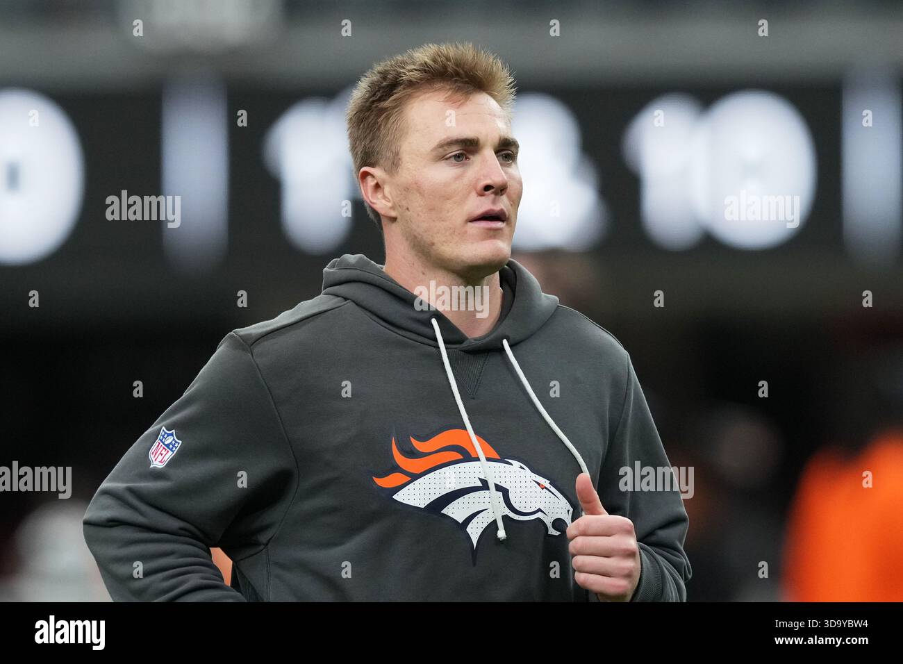Denver Broncos quarterback Bo Nix warms up before an NFL football game ...