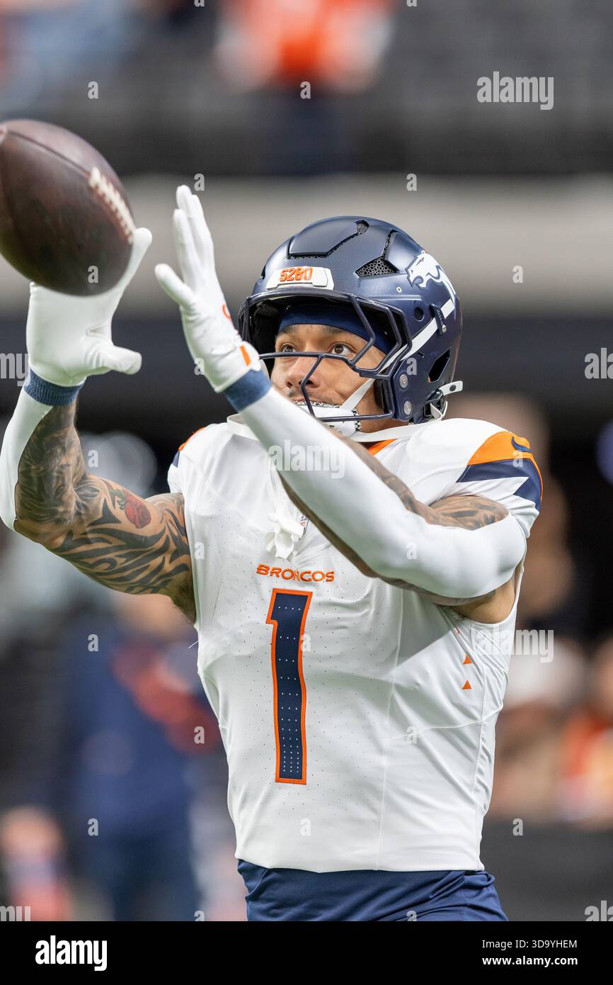 Denver Broncos tight end Evan Engram (1) warms up before playing ...