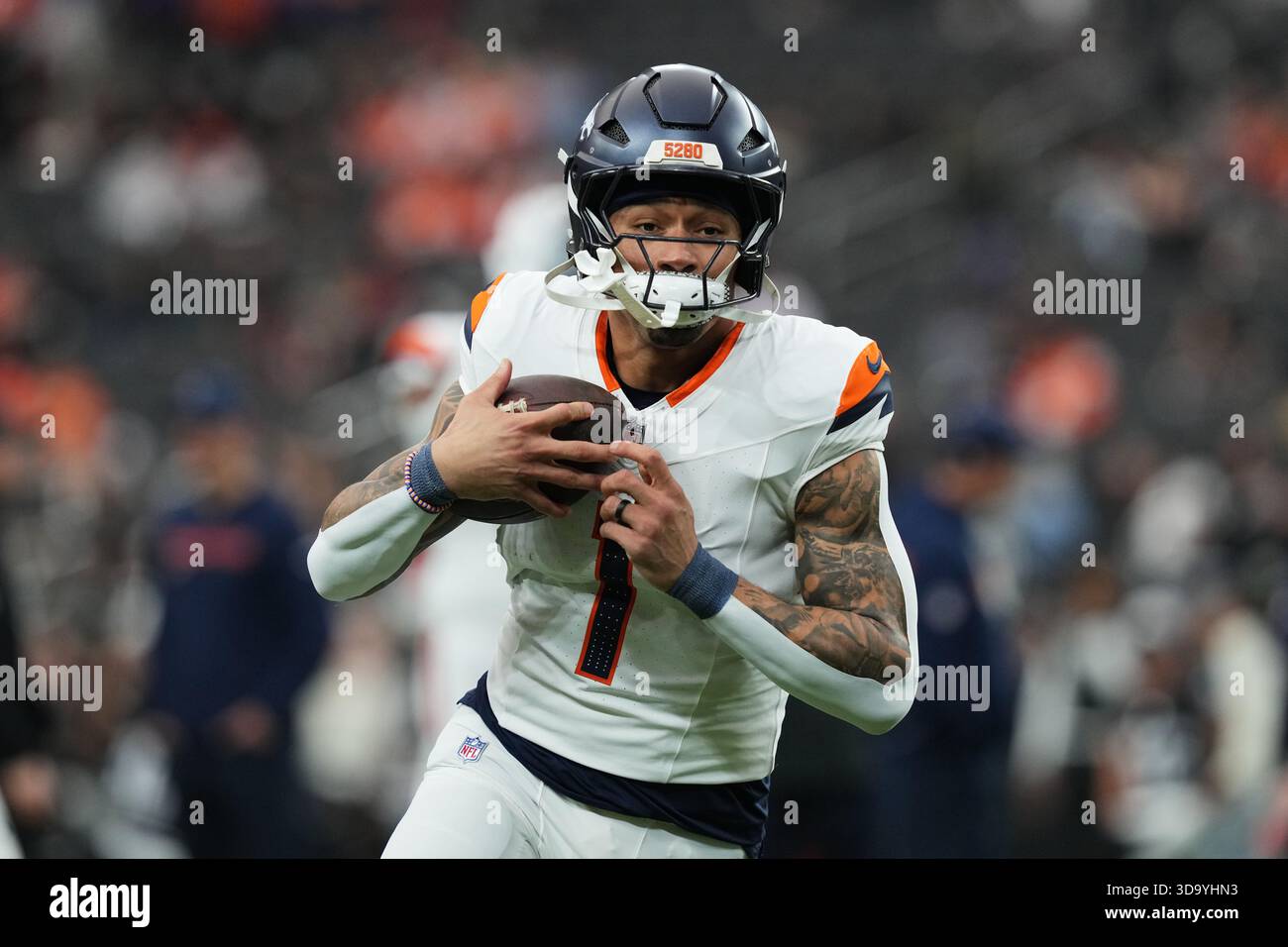 Denver Broncos tight end Evan Engram (1) warms up before an NFL ...