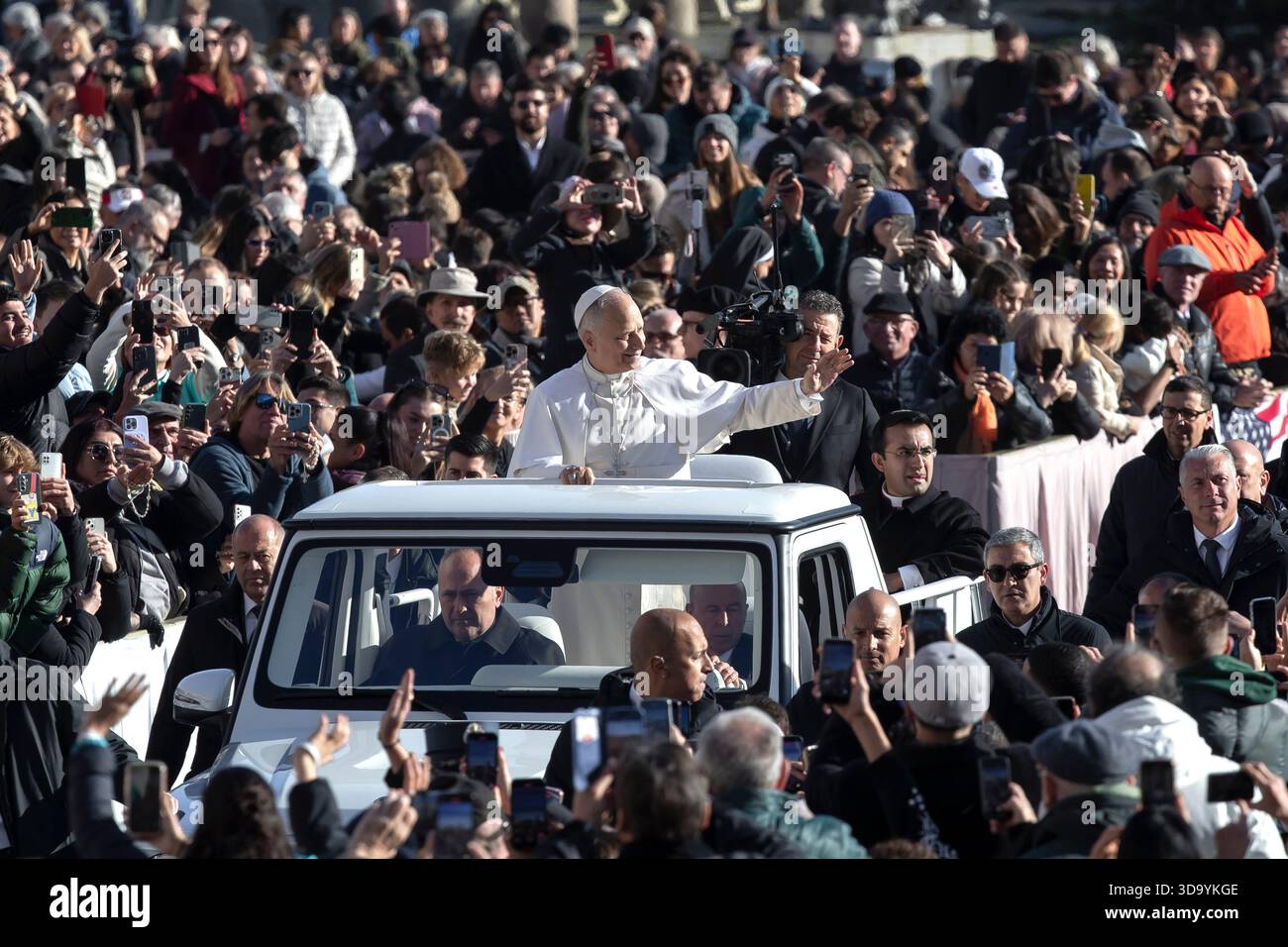 Pope Leo XIV waves as he arrives for a Jubilee audience in St. Peter's ...