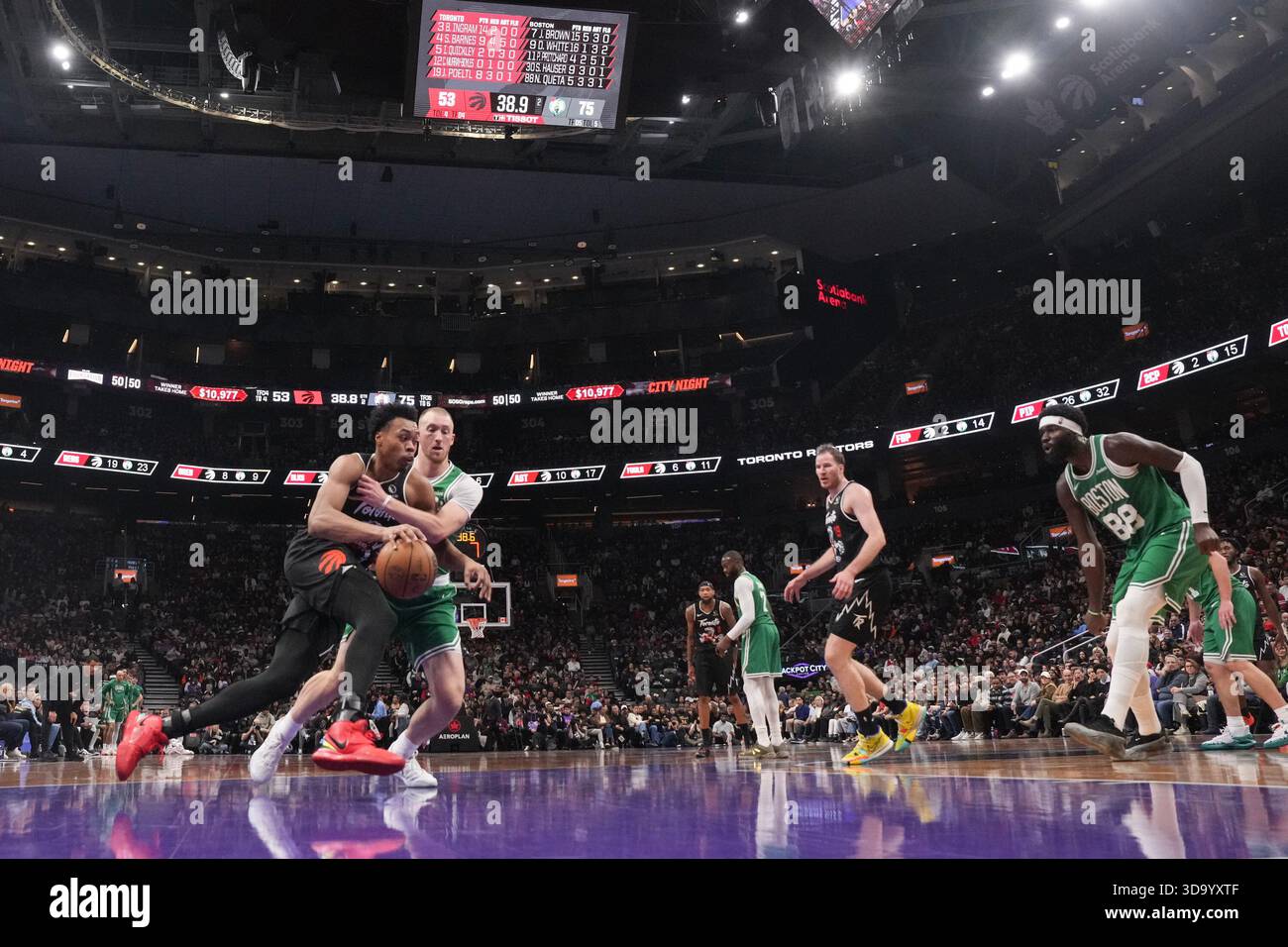 Toronto Raptors forward Scottie Barnes, left, drives past Boston ...